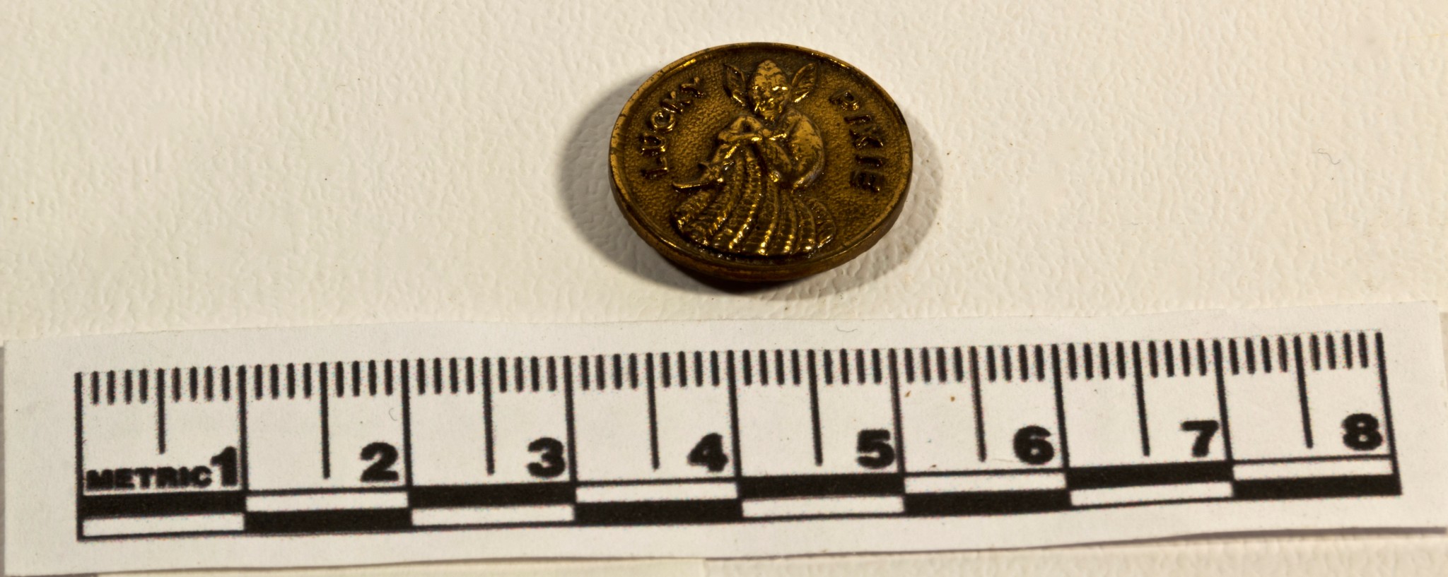 2051 - Pixie Coin: Good Luck Charm - Museum of Witchcraft and Magic